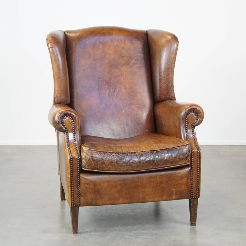Vintage English Style Sheepskin Wing Chair for sale at Pamono