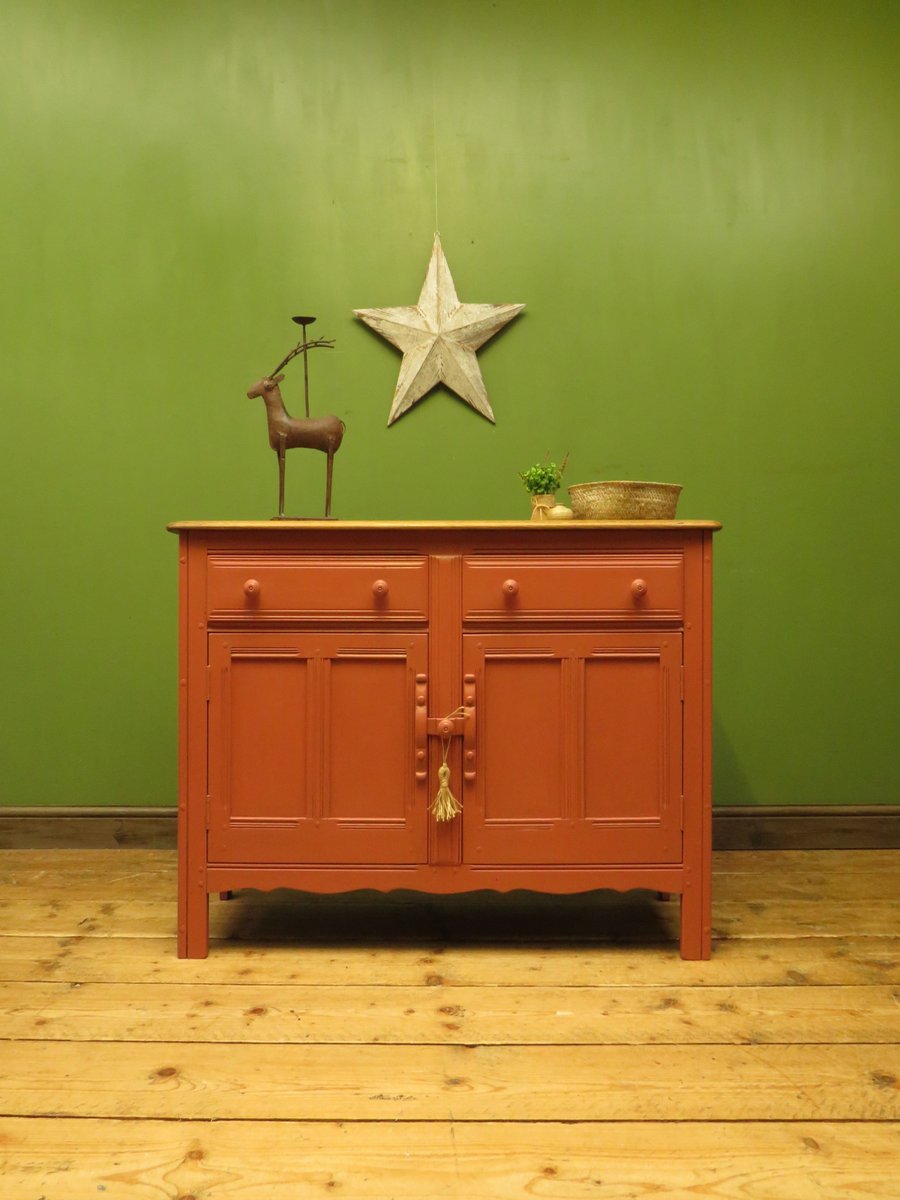 Vintage Ochre Red Sideboard from Ercol, 1970s for sale at Pamono