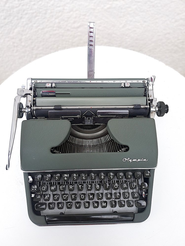 Typewriter with Case from Olympia, Germany, 1960s for sale at Pamono