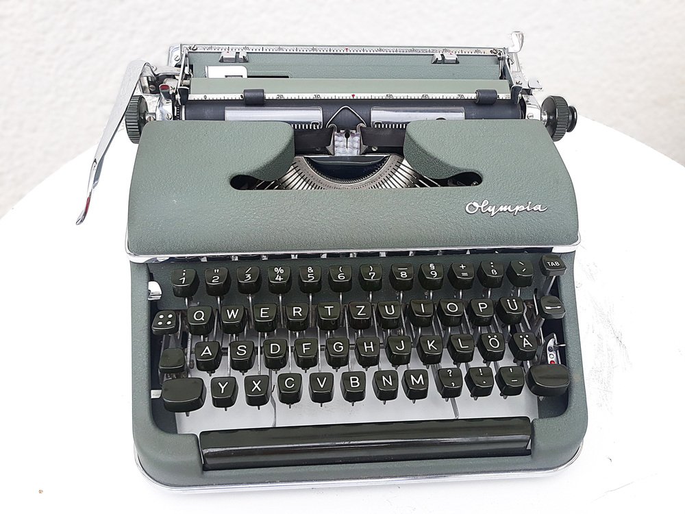 Typewriter with Case from Olympia, Germany, 1960s for sale at Pamono
