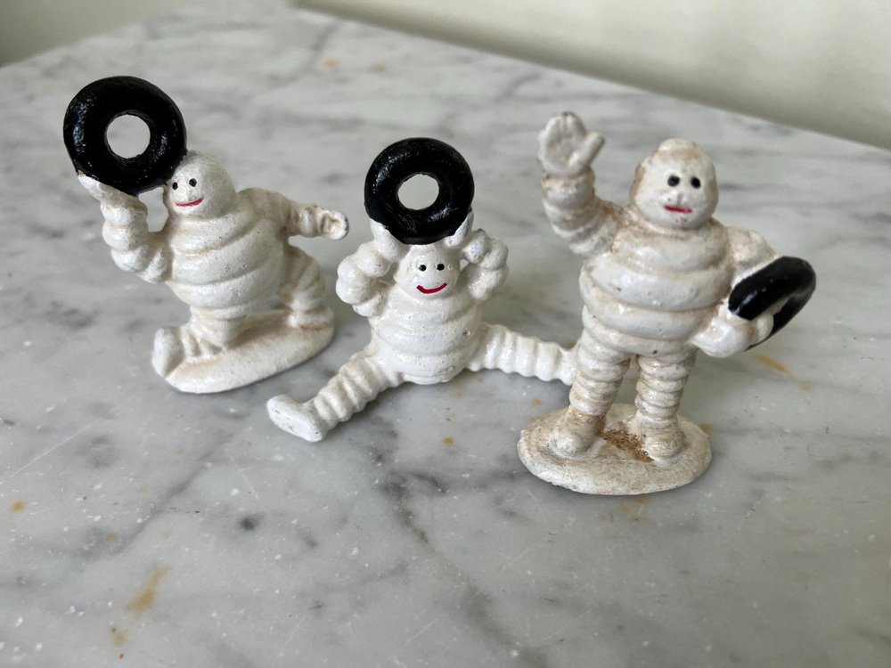 Vintage Cast Iron Michelin Man Models, Set of 3 for sale at Pamono