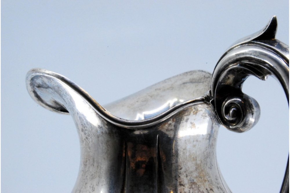 Gummed Silver Milk Jug with Raised Scrolls and Circular Base for sale ...