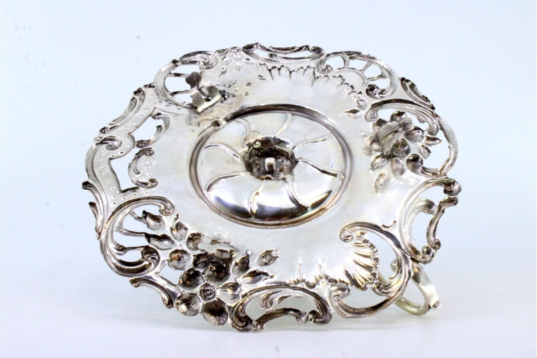 Silver Paddle with Cut-Out Base and Raised Floral Motifs for sale at Pamono