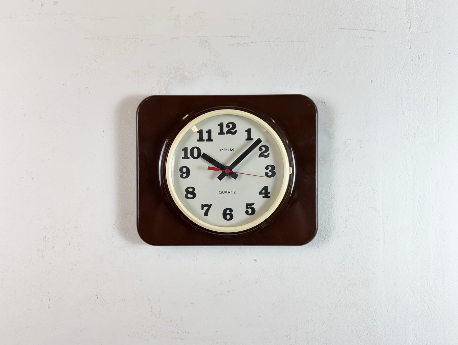 Vintage Brown Plastic Wall Clock from Prim, 1970s for sale at Pamono