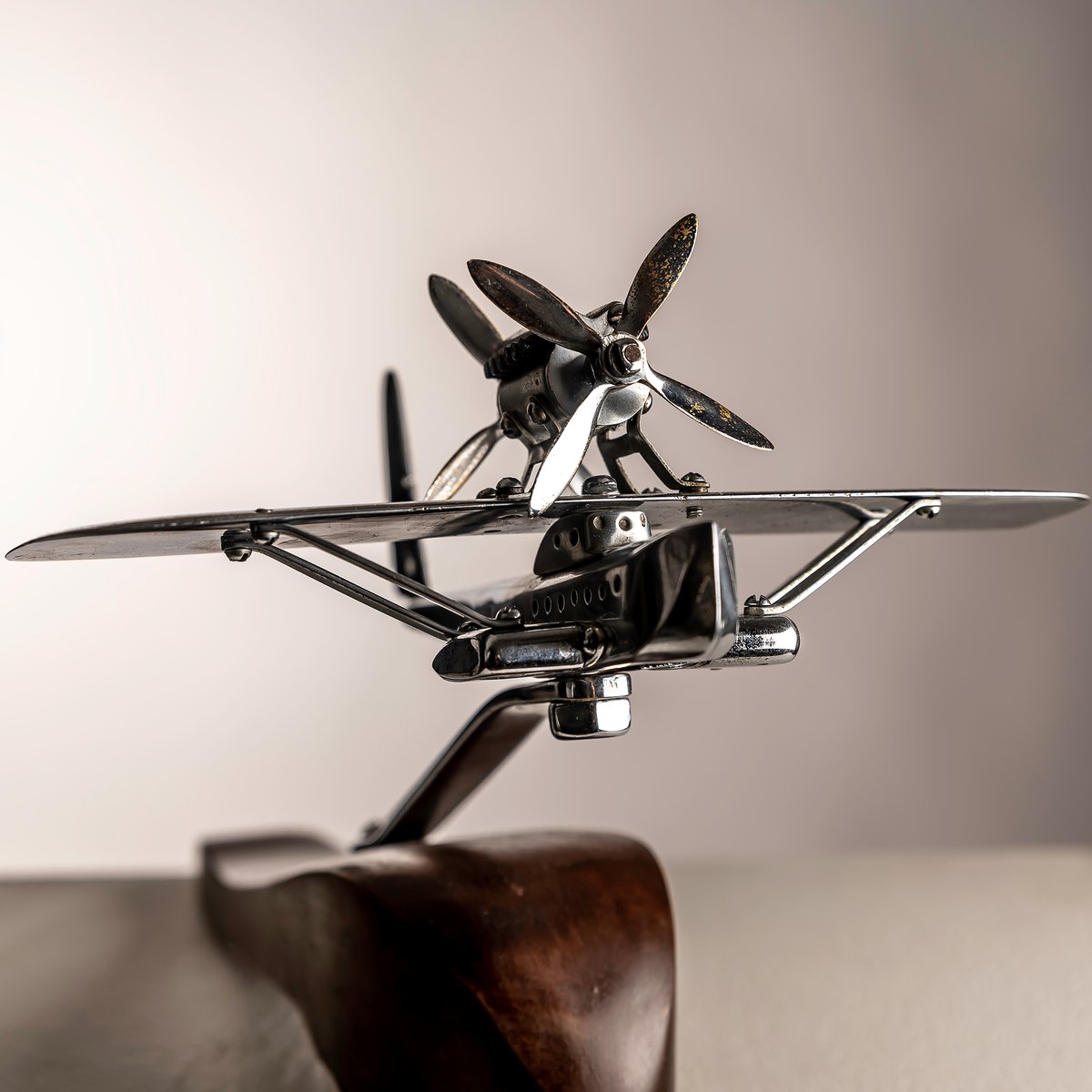Art Deco Chrome Airplane on Wooden Base, 1940s for sale at Pamono
