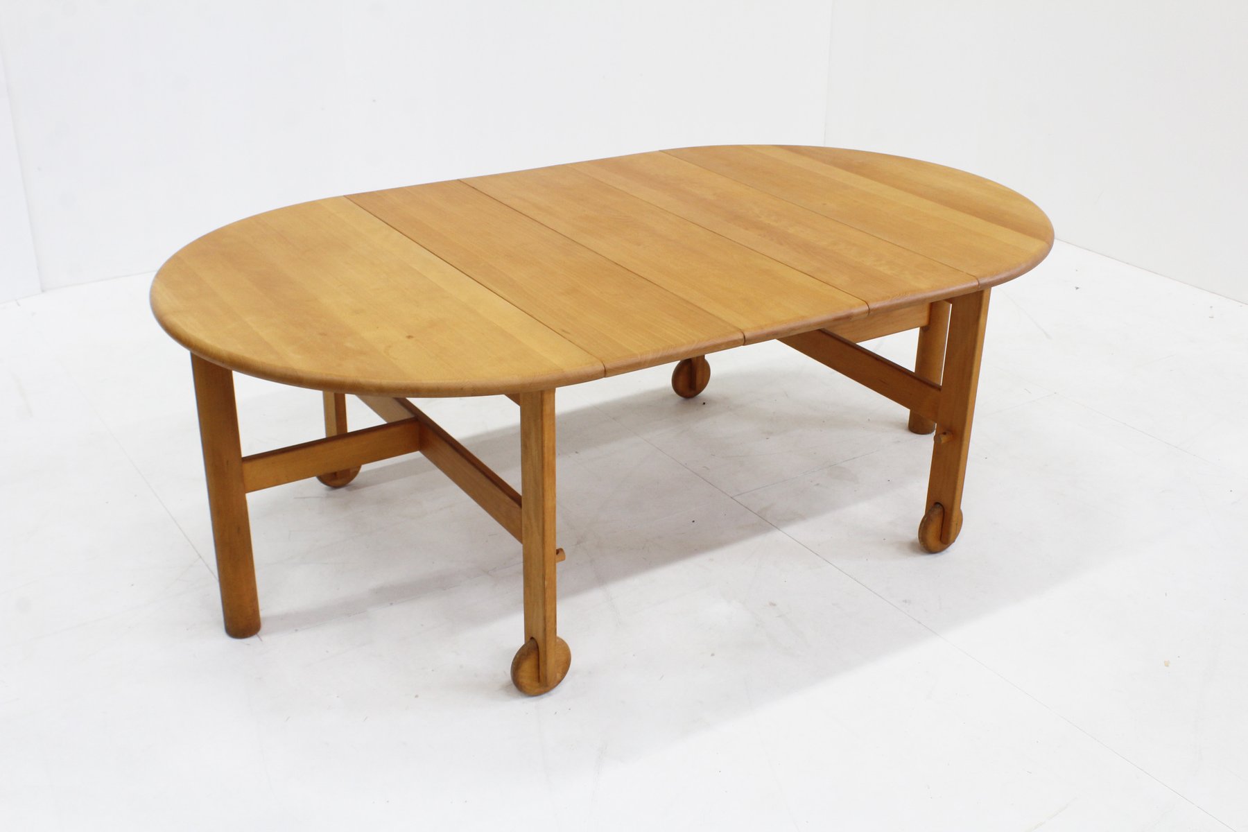 Vintage Round Extendable Dining Table in Wood, 1960s for sale at Pamono