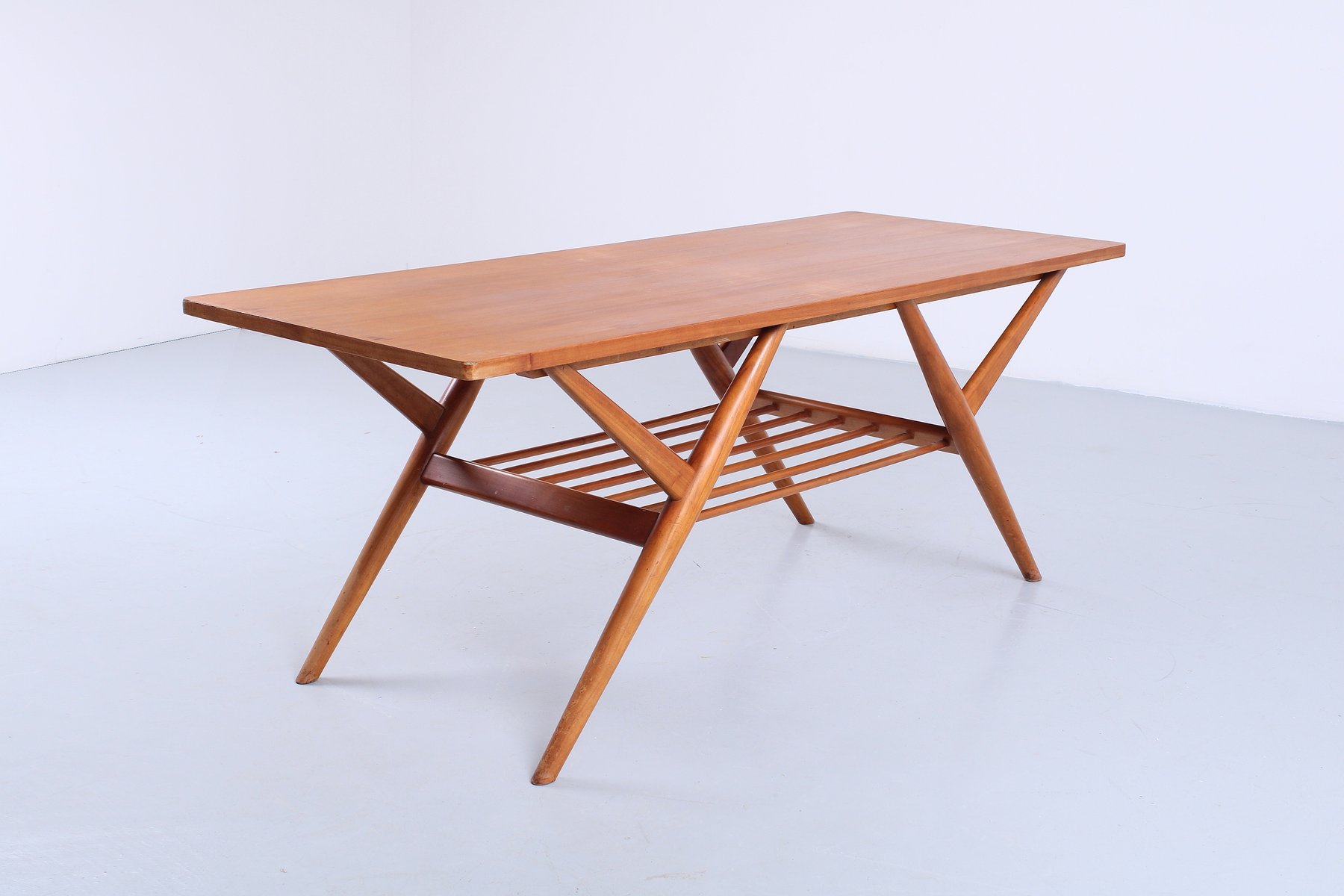 Danish Spindle Coffee Table with Magazine Rack, 1950s for sale at Pamono