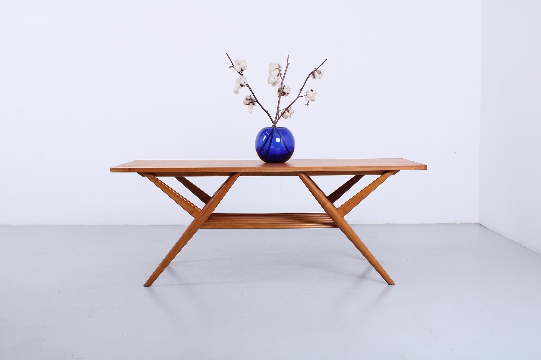 Danish Spindle Coffee Table with Magazine Rack, 1950s for sale at Pamono