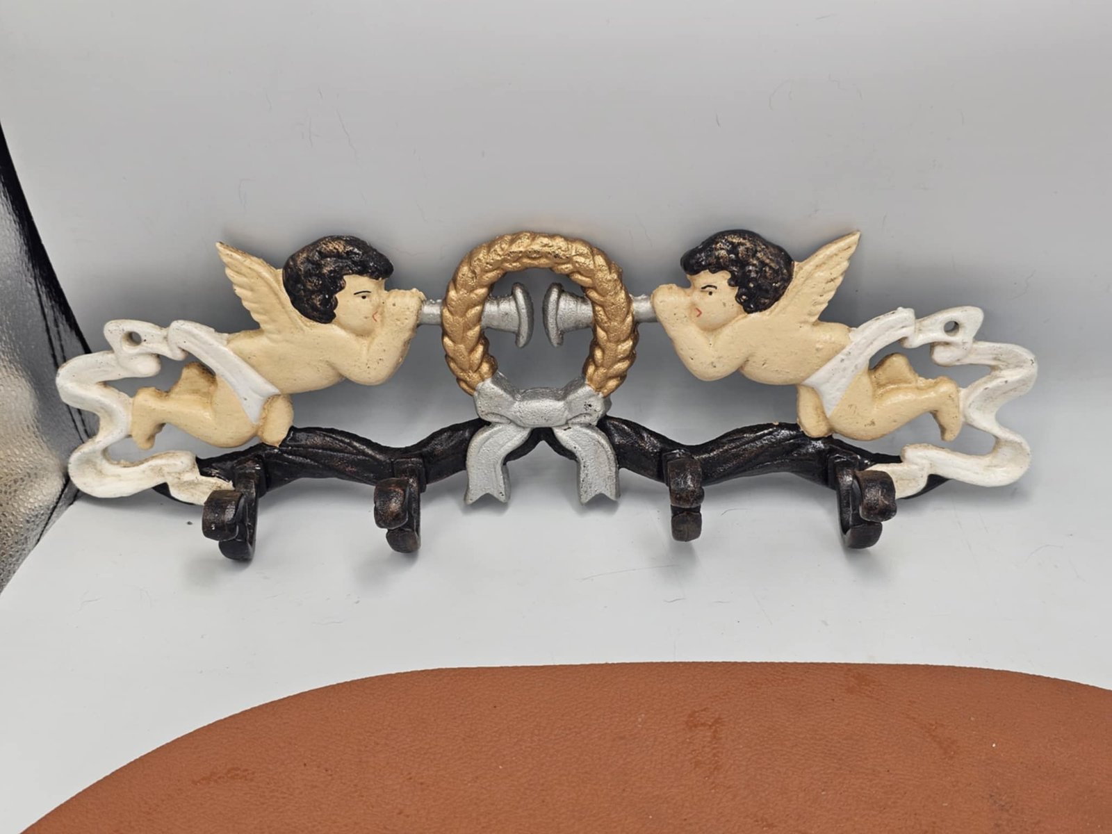 Art Deco Cast Iron Angel Hanger, 1920s for sale at Pamono