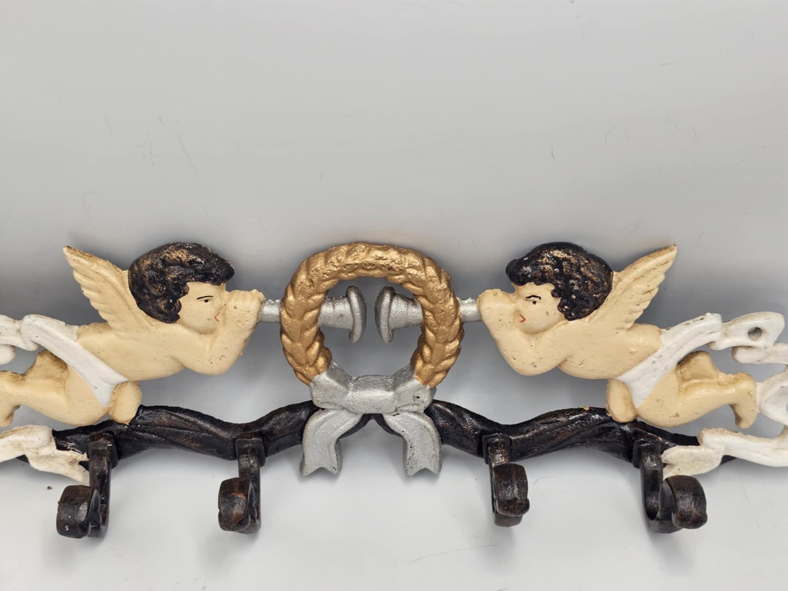 Art Deco Cast Iron Angel Hanger, 1920s for sale at Pamono