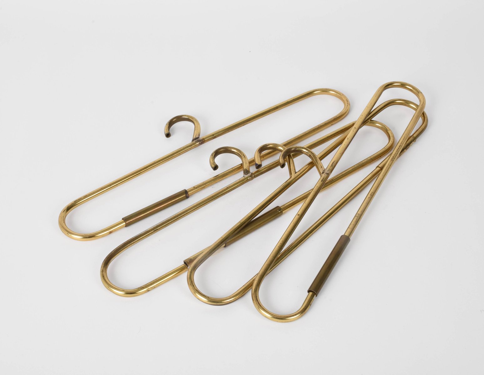 Vintage Brass Coat Hangers, 1970s, Set of 4 for sale at Pamono